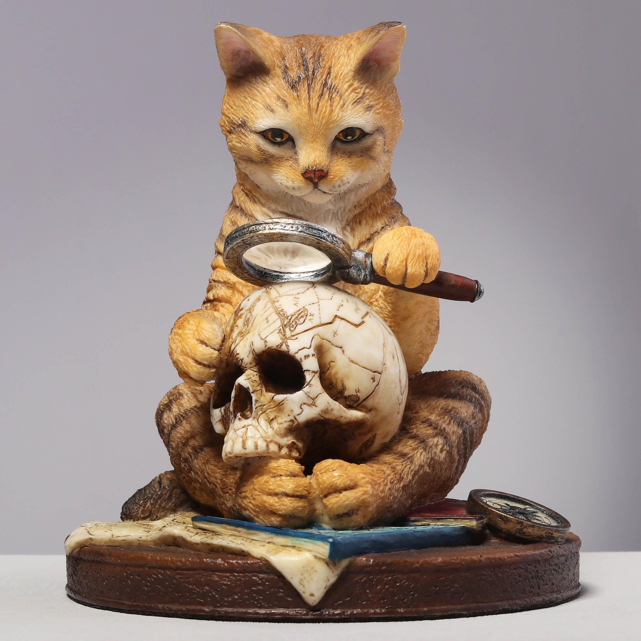 A Real Head Scratcher - Cat Looking at Skull Figurine | Gothic Gifts